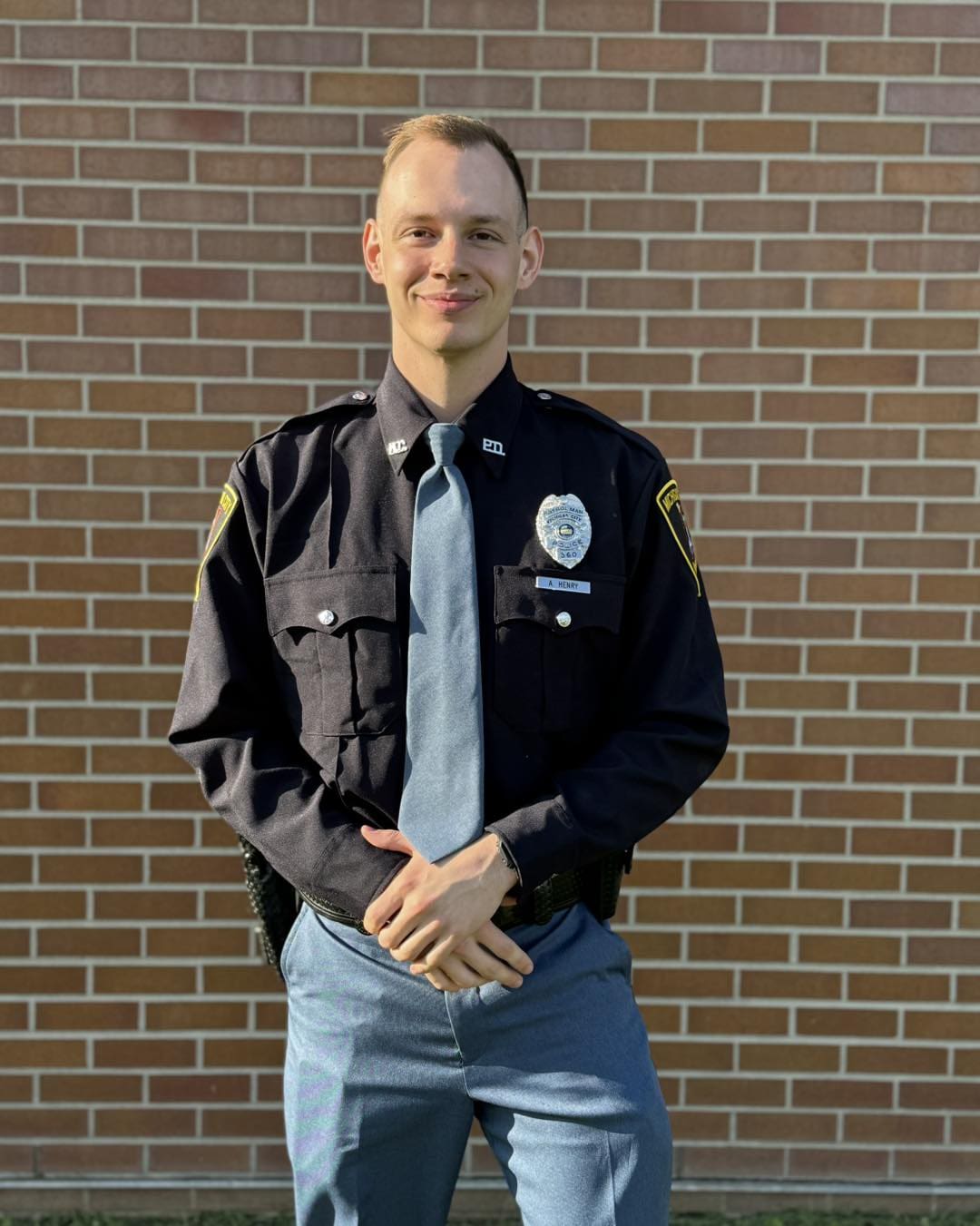 MCPD probationary officer graduates form Indiana Law Enforcement Academy